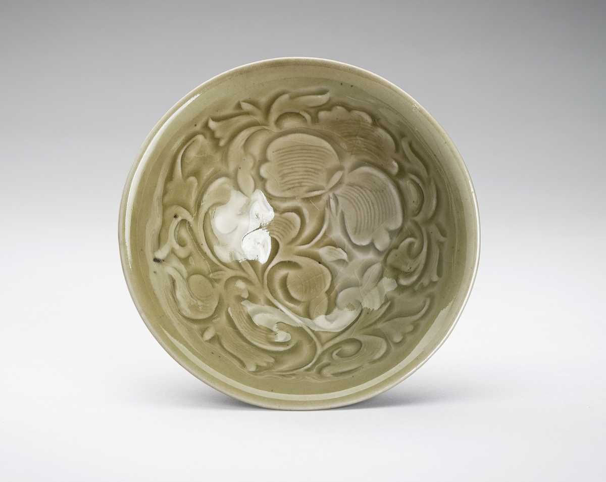 Lot 627 - A SONG STYLE YAOZHOU CELADON-GLAZED