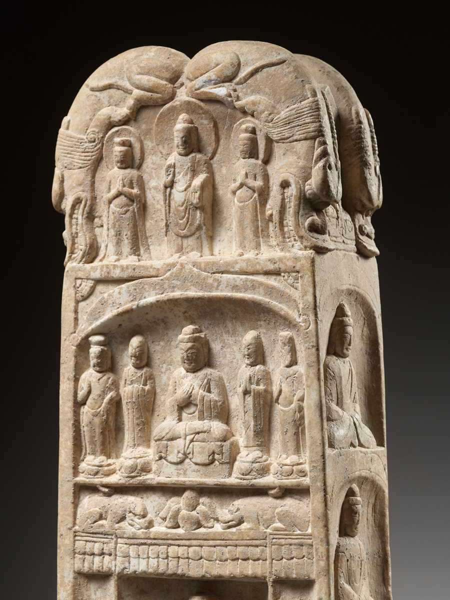 Lot 499 - A BUDDHIST STELE, FINELY CARVED FROM WHITE